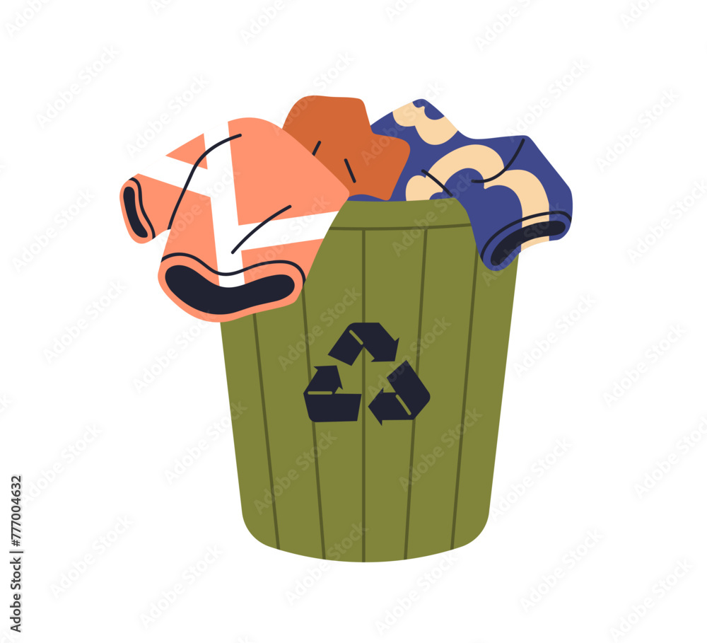 Recycled clothes in waste bin. Eco-friendly reusable textile in ...