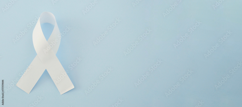 White ribbon as symbol of peace on blue background. World Day of Peace ...