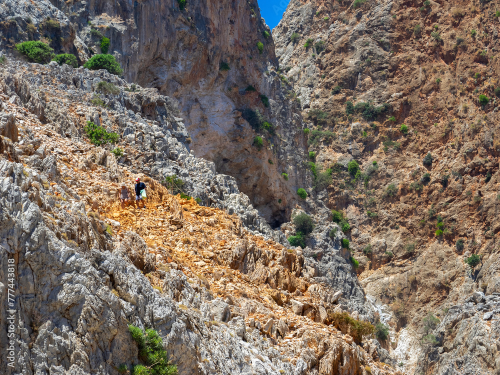 Rugged rocky path on a steep slope (Seitan Limania, Crete, Greece ...