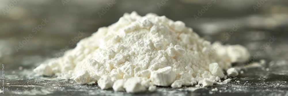 An impactful shot of a heap of fine white chalk powder against a ...