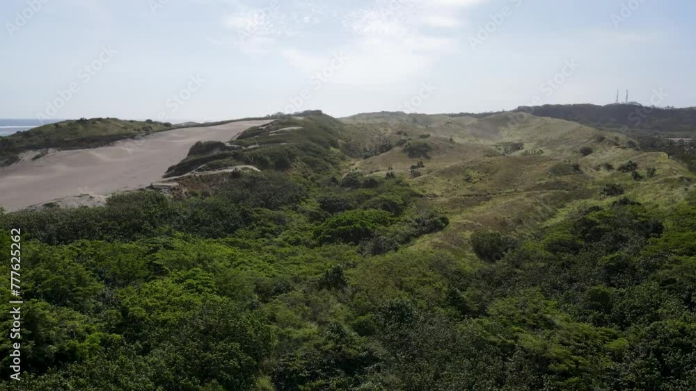 Aerial view of sand dunes and dry forest in Fiji's first national park ...