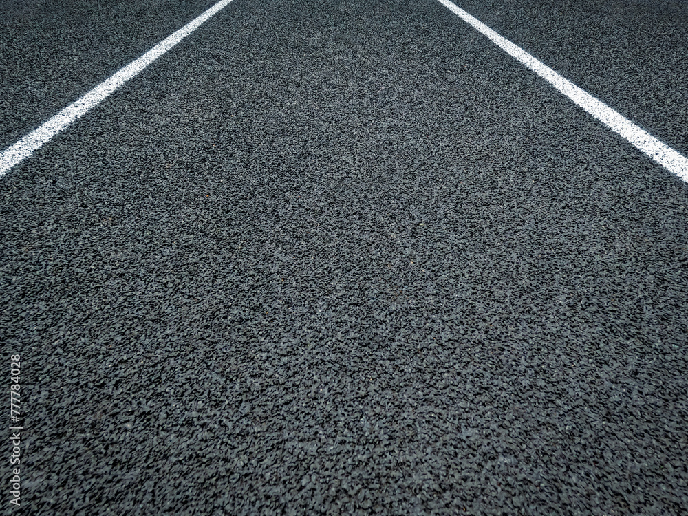 Track and Field Running Lanes. Overhead view of a rubber black running ...