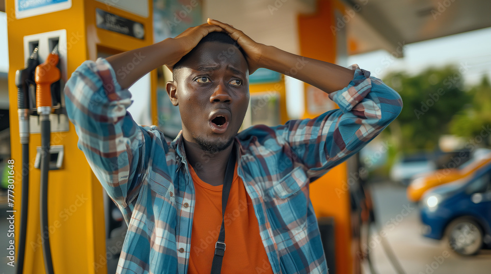 African man shocked upon seeing the high price of fuel at gas station ...