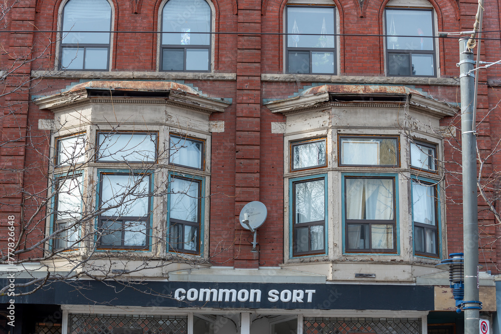 exterior building windows facade and sign of Common Sort - Riverside, a ...