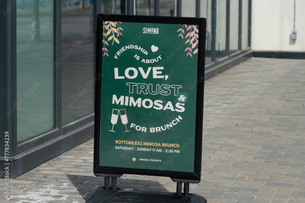 outdoor sign for Simona, an Italian restaurant, located at 59 Merchants ...
