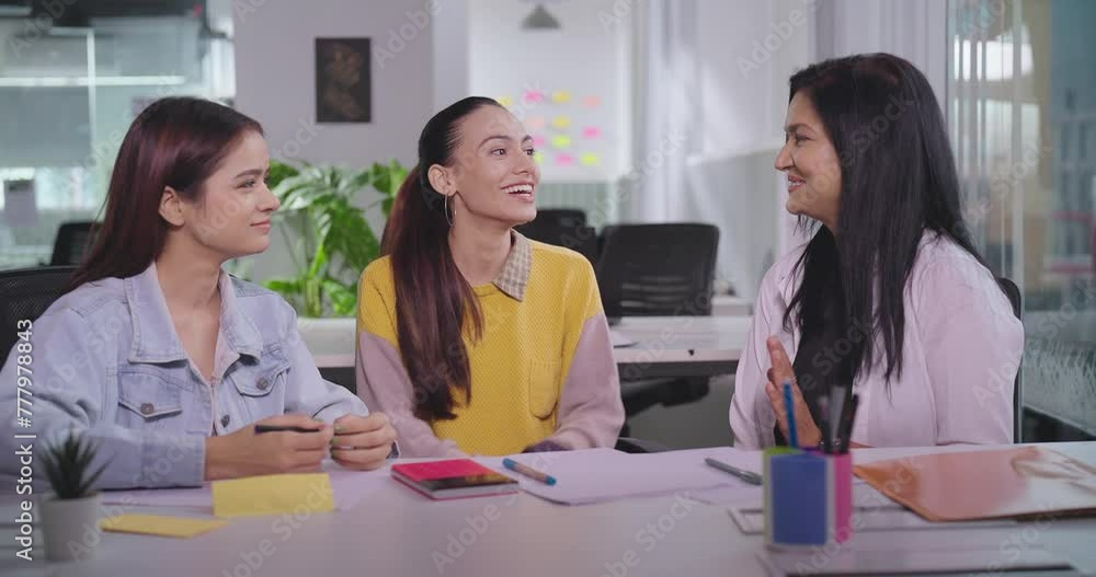 Indian Asian Hindu happy gen z boss woman ladies staff team talk share ...