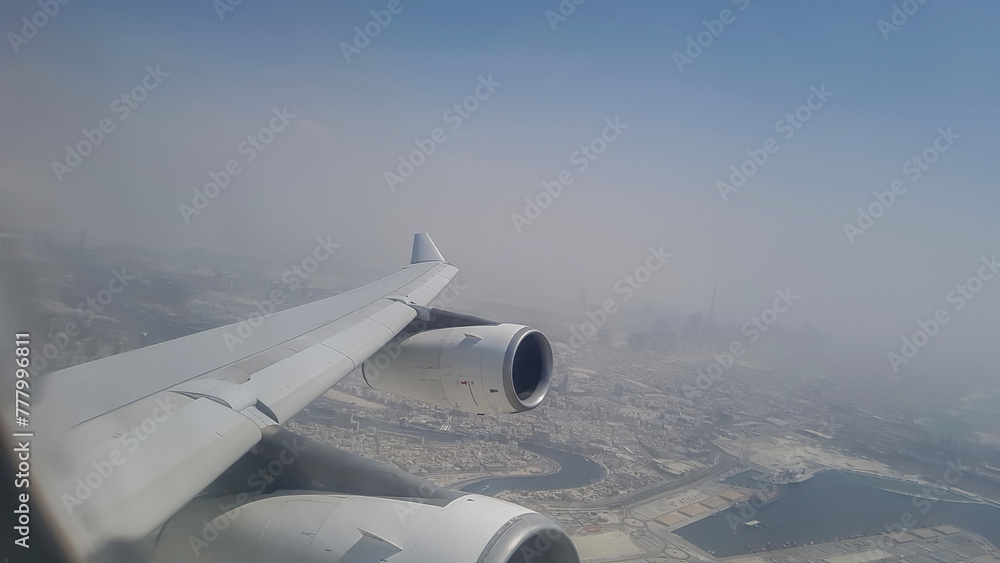 The view of the city of Dubai at the time of take-off from the window ...