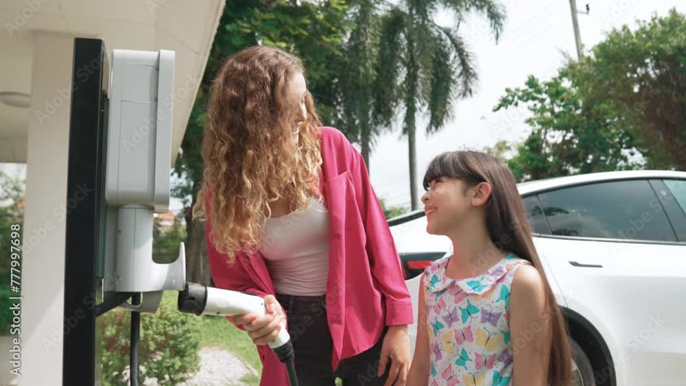 Happy little young girl learn about eco-friendly and energy ...