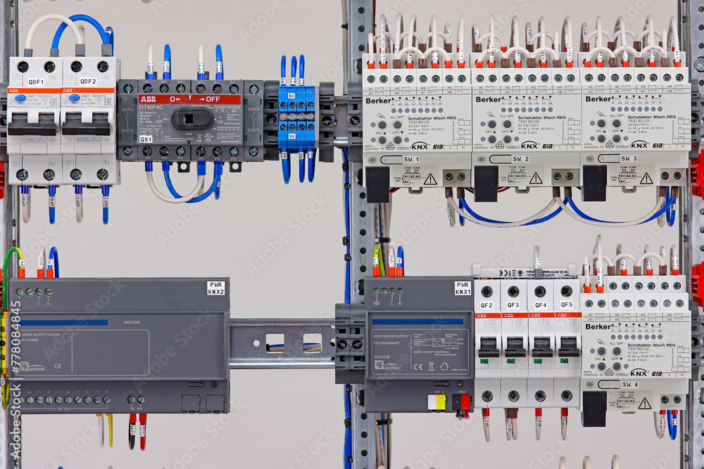 An electric switchboard with modules for protection and control of ...