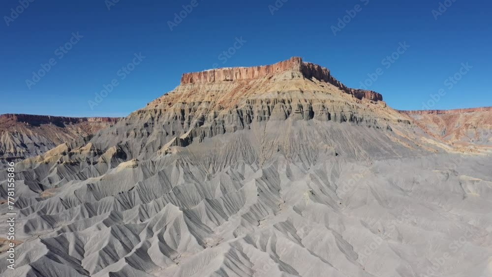Mudstone formations of steel blue wavy sharp rocks ridges western Usa ...