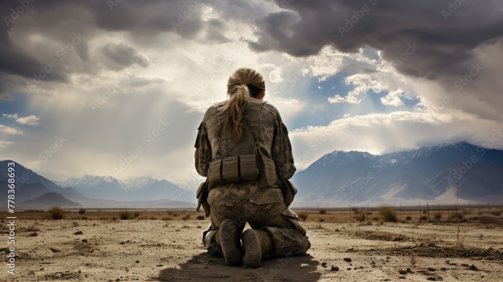 Soldier kneeling under dramatic sky in desert - A poignant scene of a ...