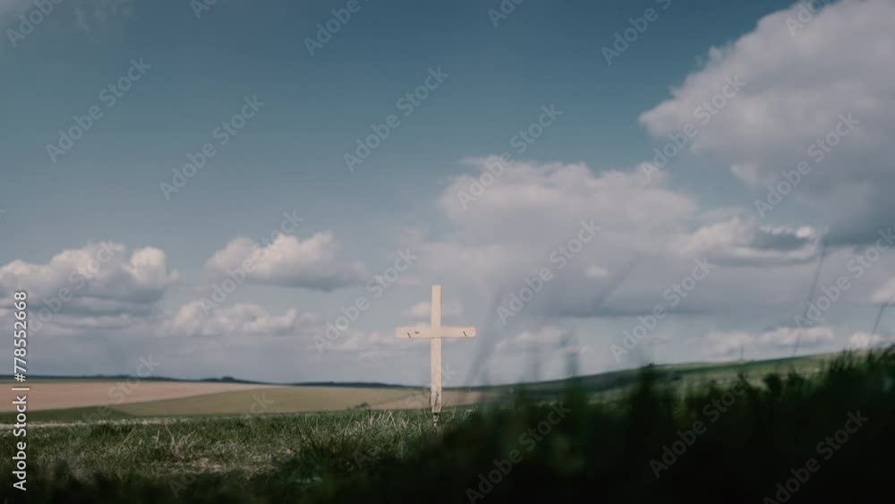 Vidéo Stock Cross with nails in it, in beautiful field in 4k slow ...
