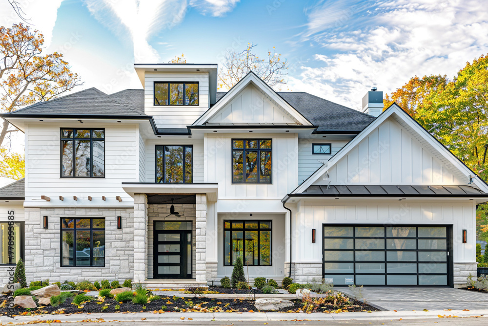 High-end modern home without a garage, wrapped in striking white siding ...