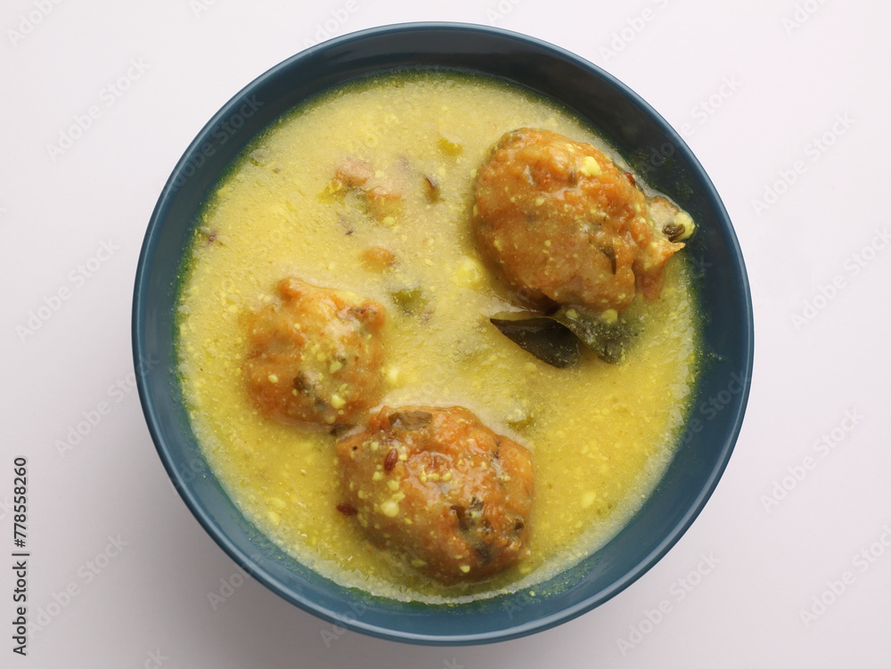 Kadhi Pakora, a Punjabi cuisine made with deep-fried fritters dipped in ...