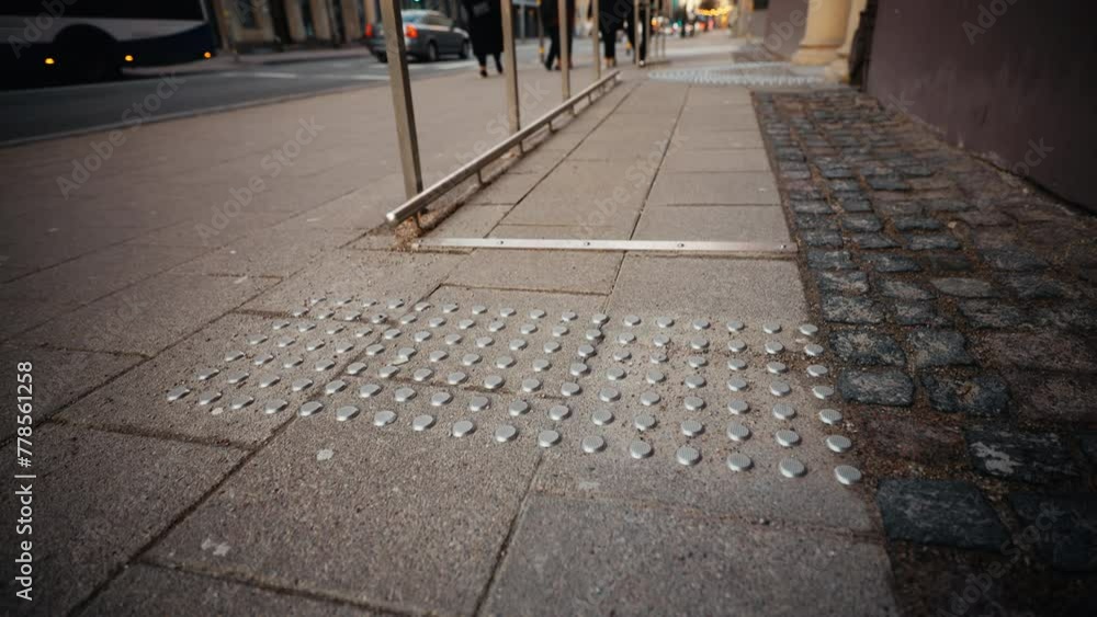City infrastructure: Aerial shot of tactile pavement with braille ...