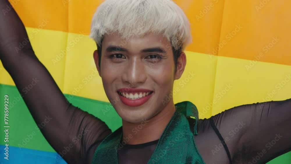 Young Asian Transgender Man Standing and Showing LGBT Community Flag to ...