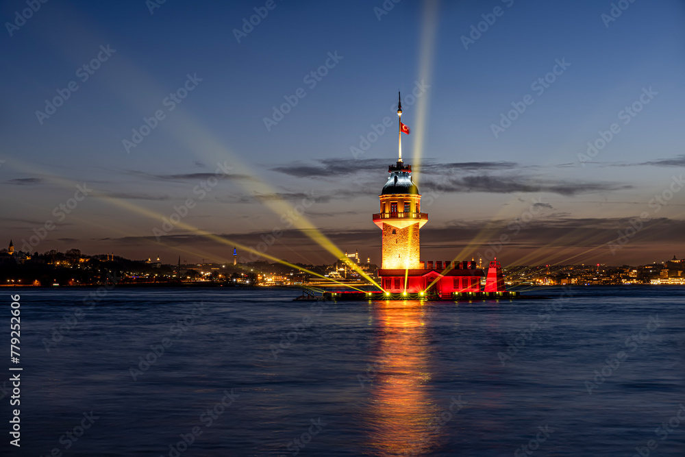iery sunset over Bosphorus with famous Maiden's Tower (Kiz Kulesi) also ...