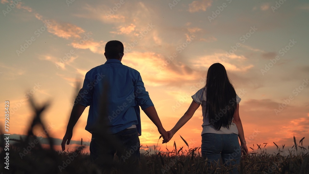 Foto de Team of people look at their future together at sunset. Family ...