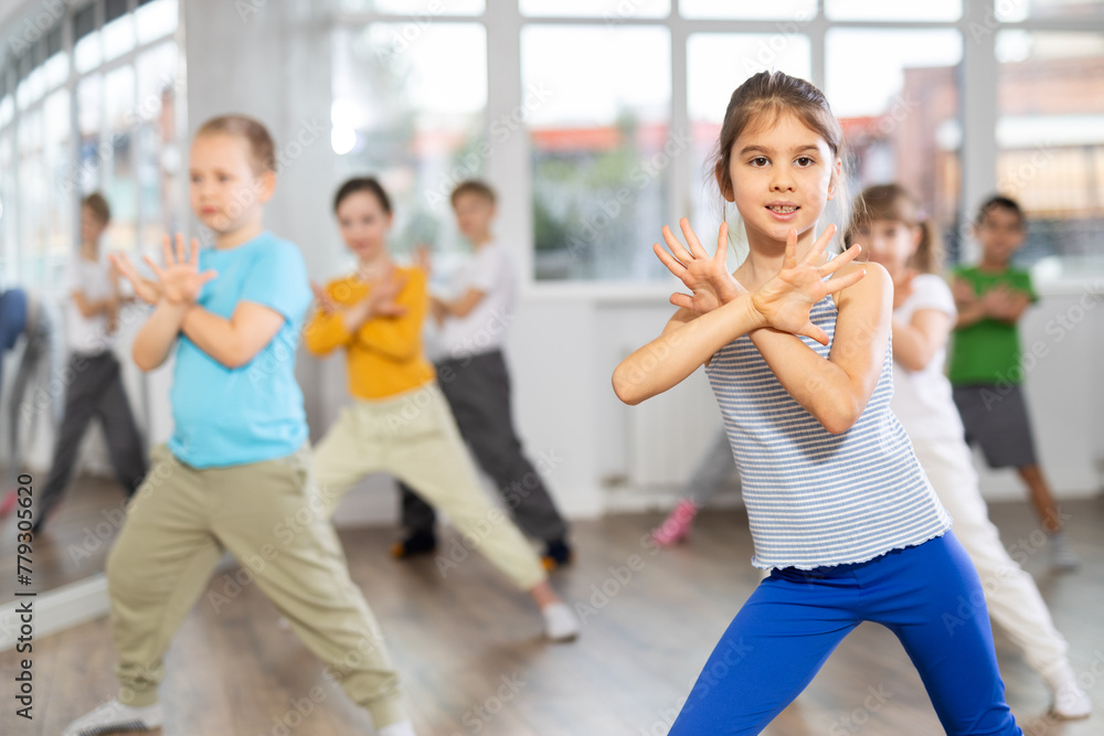 Girl learns to dance hip hop during childrens master class in studio ...