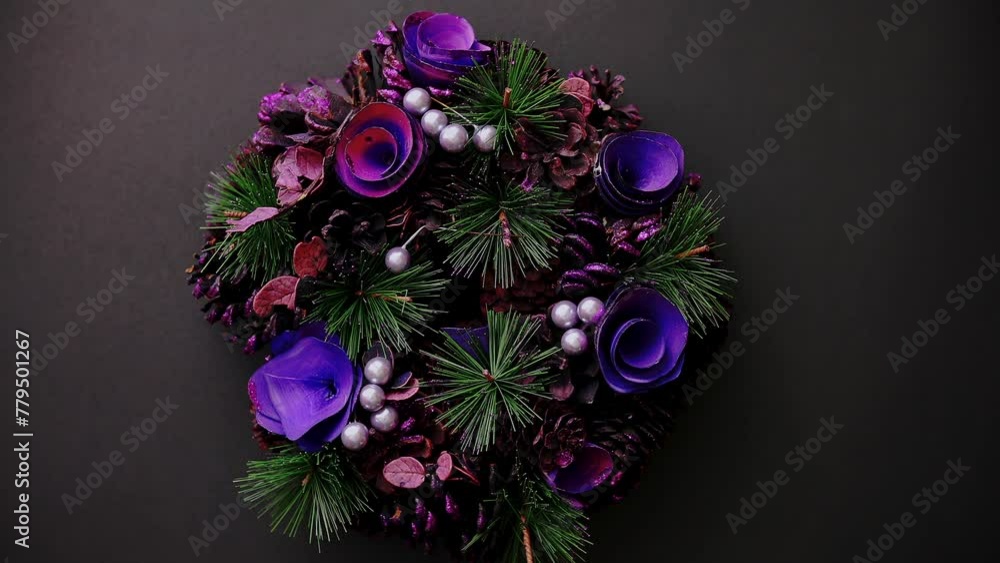 A top-down rotating view of an artificial flower arrangement in a ... A top-down rotating view of an artificial flower arrangement in a ...