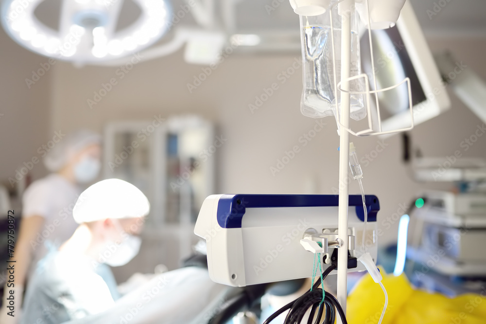 Gynecologist operation patient in gynecological chair. Doctor performs ...