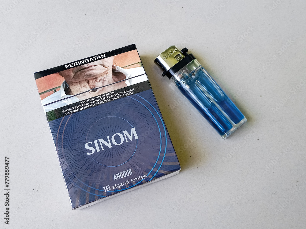 Sinom new variant of Kretek grape flavor up close. Packaged cigarettes ...