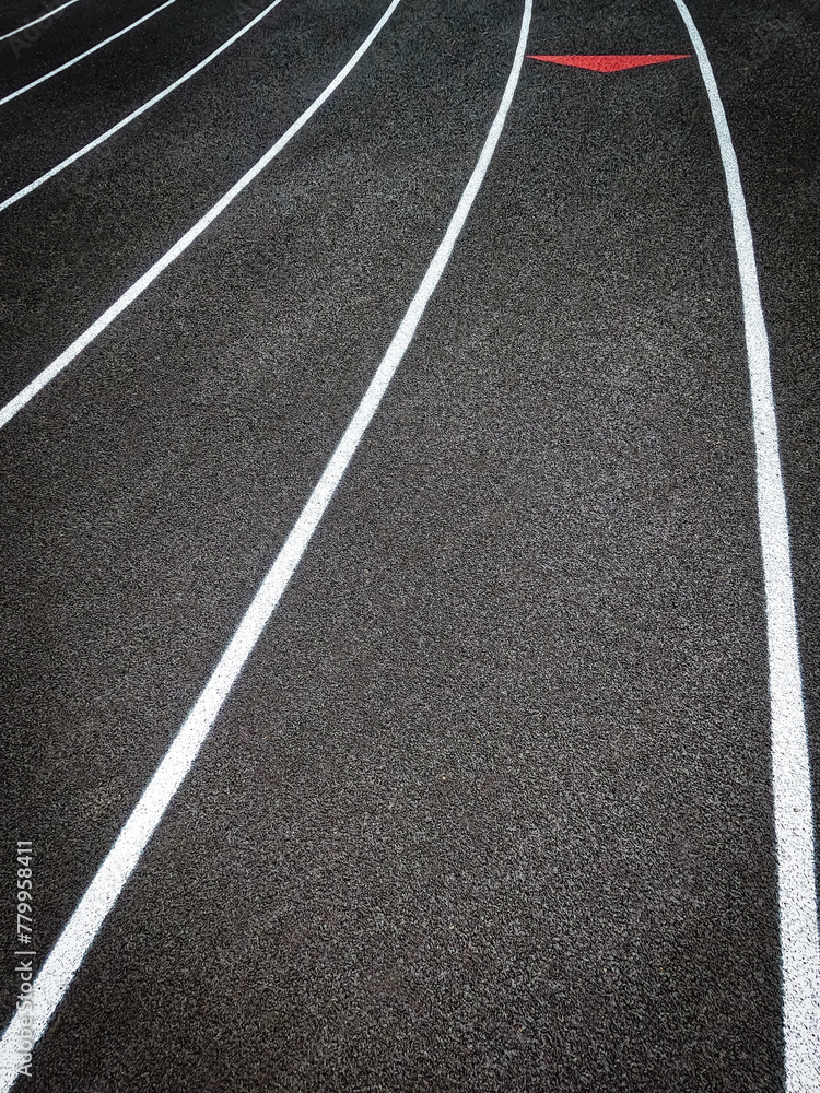 Track and Field Running Lanes. Overhead view of a rubber black running ...