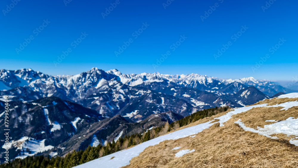 Scenic view on snow capped mountain peaks of Karawanks, Julian and ...