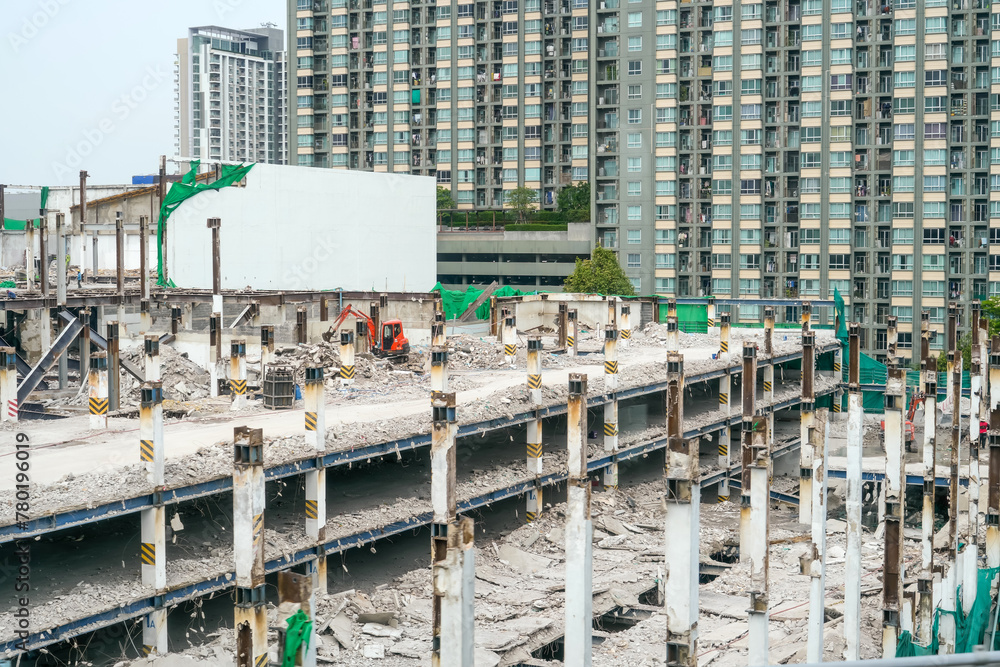 Demolition of the building floor by floor, workers dismantling load ...