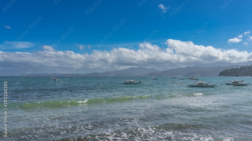 Many traditional Filipino double-outrigger dugout bangka boats are ...