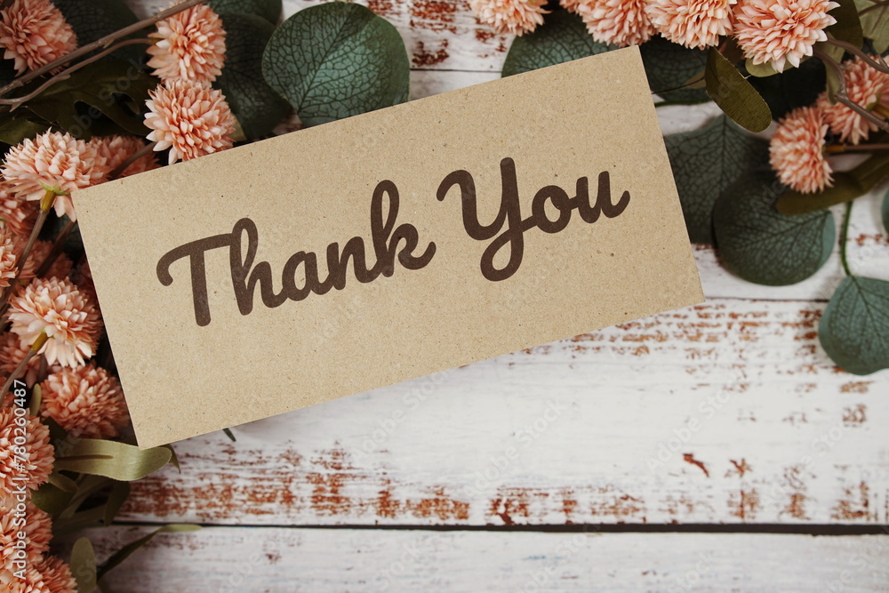 Thank You text message on paper card with flowers border frame on ...