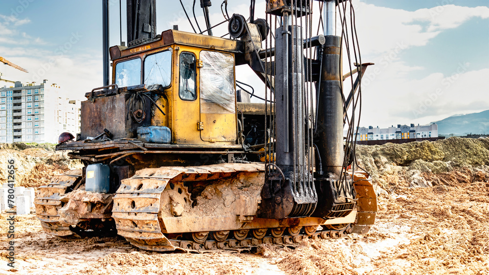 Pile driving machine. Diesel hammer pile driving machine working on ...