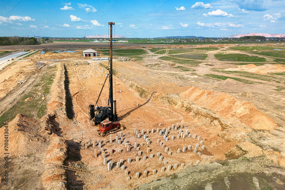 Pile driving machine. Diesel hammer pile driving machine working on ...