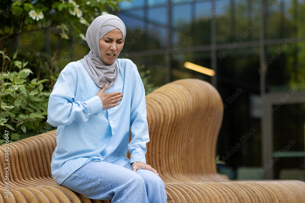 Adult black woman in jeans having tension in chest and feeling about ...