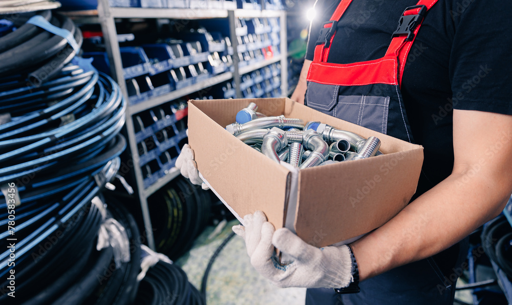 Industrial worker hold box with fitting for pipe and hydraulic hoses ...