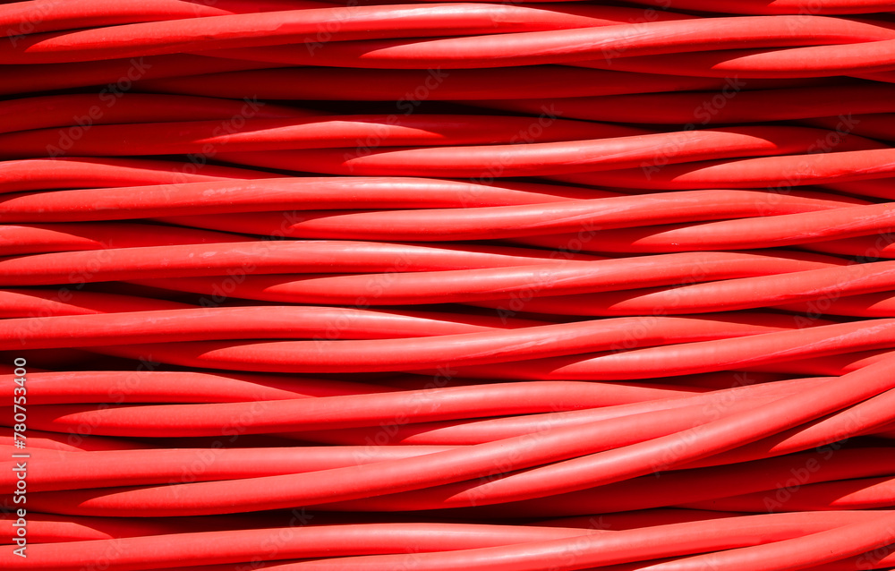 background of detailed red electrical cable used for high voltage power ...
