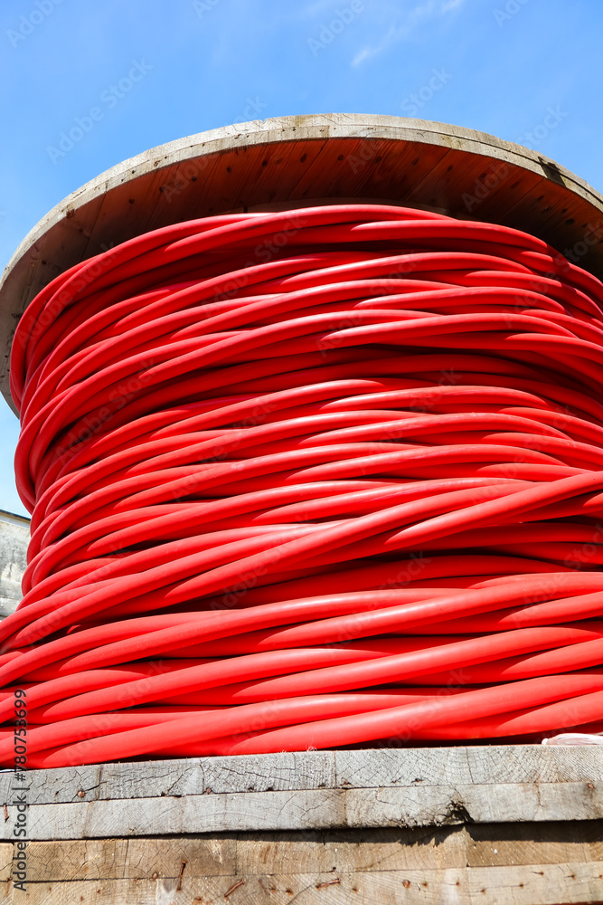 Thick red insulated electrical cable reel for high voltage Stock Photo ...