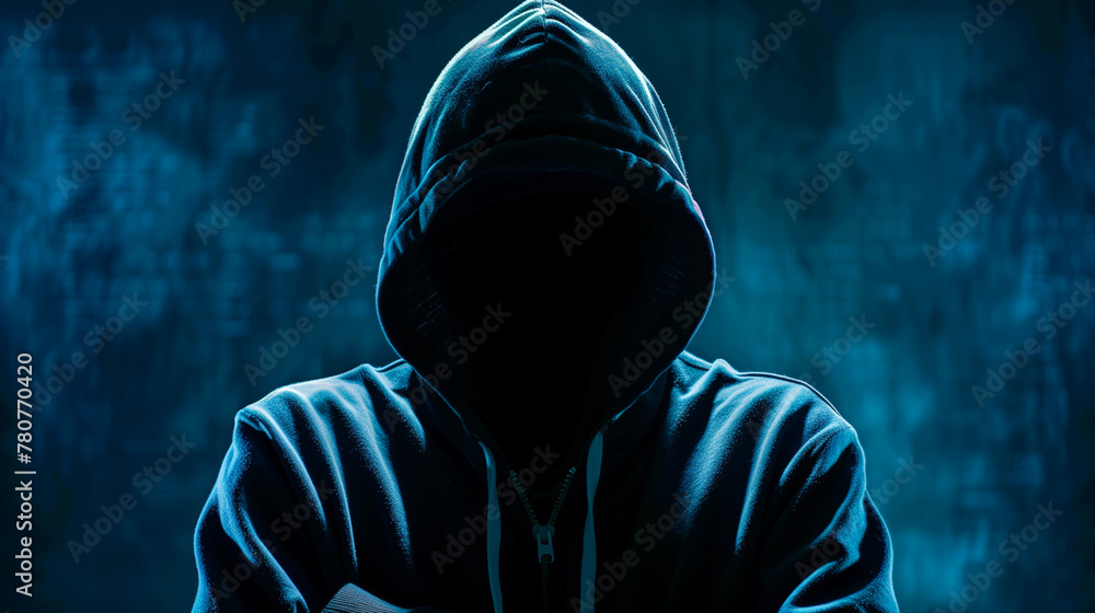 Mysterious Figure in Hoodie with Hidden Face. An ominous silhouette of ...