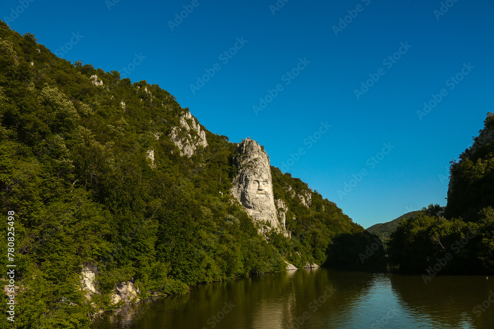 Rock sculpture. Rock sculpture of king Decebal on the bank of Danube ...