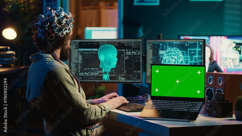 Computer scientist uploading brain into cyberspace, gaining digital persona using green screen ...