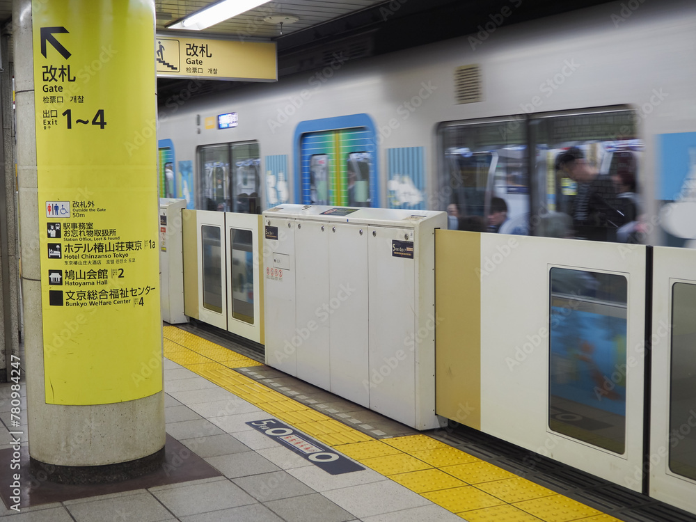TOKYO, JAPAN - April 7, 2024: Detail of a subway train with a Moomin ...