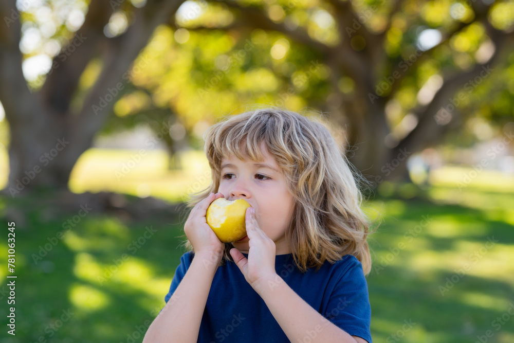 Happy teen boy with apple. Photo of child holding apple. Kid with apple ...