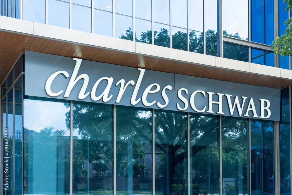 Houston, Texas, USA - April 7, 2024: Charles Schwab logo sign at one of ...
