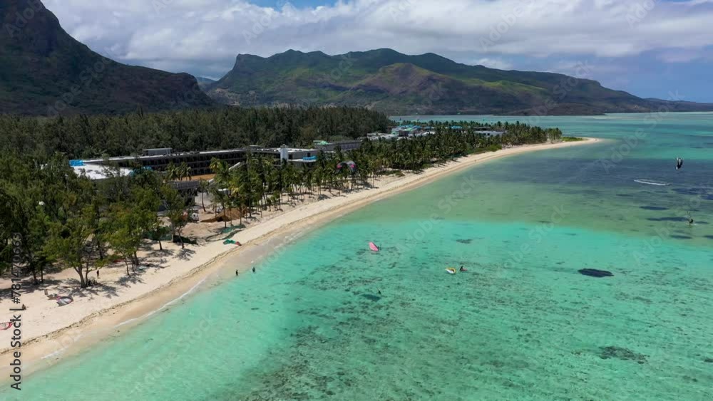 Kitesurfers, windsurfers on the Le Morne beach, famous aquatic sports ...