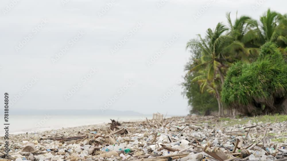 coastal crisis, plastic pollution littering tropical beach, man-made ...