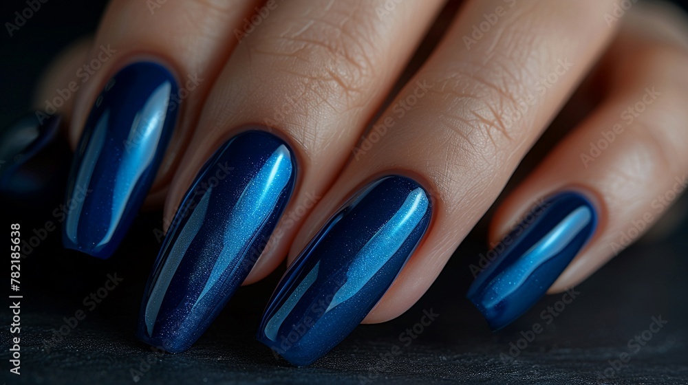 Elegant blue nails in a close-up, capturing the latest fashion trend ...