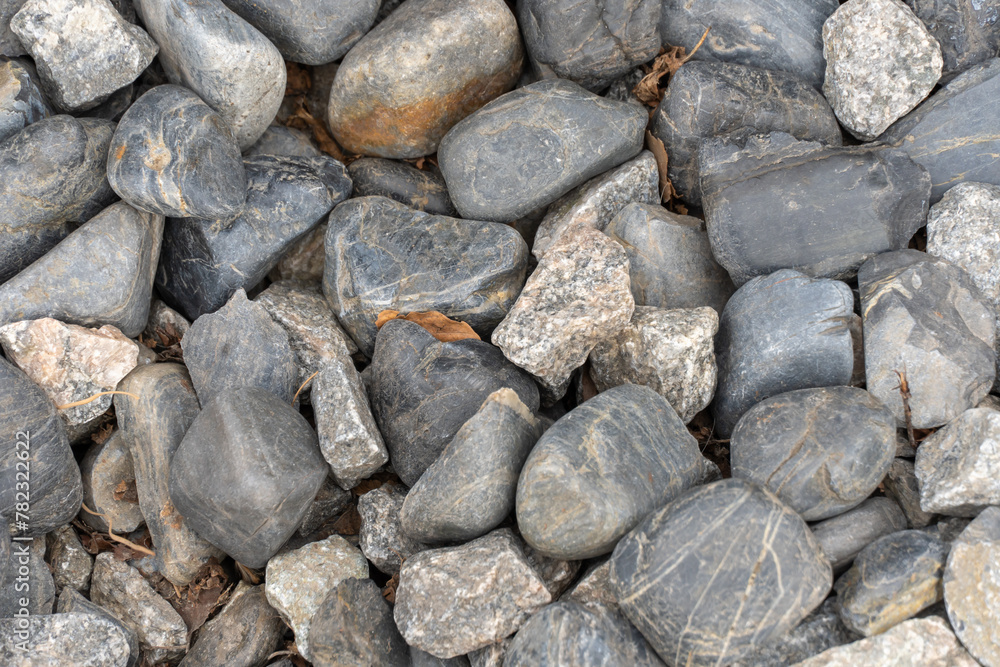 Heap grey stone for design in park and garden. Geometric pebbles close ...