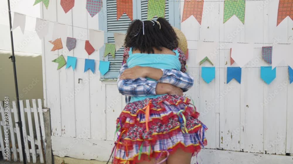 June Party in Brazil, romantic brazilian couple hugging and spinning at ...