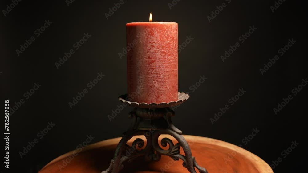 Ancient old red candle light burning on medieval gothic candlelight ...