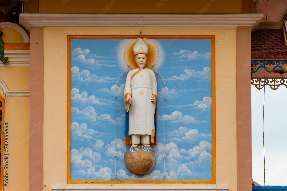 Statue Of Caodai God On The Wall Of Tay Ninh Holy See (Cao Dai Great ...